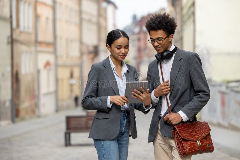 Friends Going Home after Work and Discussing Something Stock Photo ...