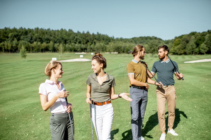 Friends on the golf course stock photo. Image of hobby - 162974914
