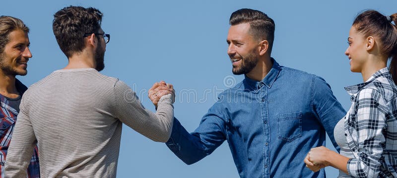 Friends Greet Each Other with a Handshake Stock Photo - Image of people ...