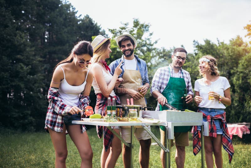 Friends Grilling and Having Fun Outdoors Stock Image - Image of leisure ...