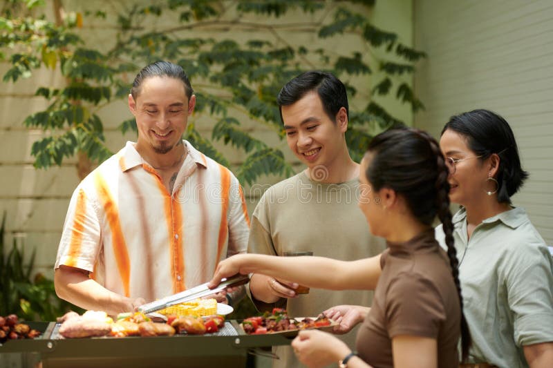 Friends Grilling Meat and Vegetables Stock Image - Image of seasoned ...