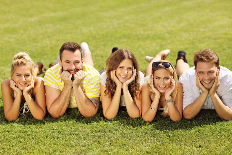 Friends Group Having Fun Together on Grass Stock Image - Image of ...