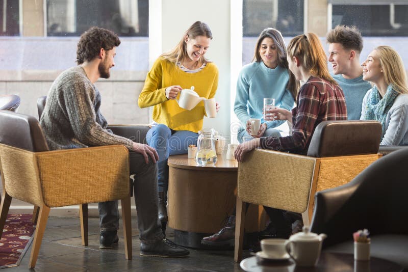 Friends Having Afternoon Tea in a Cafe Stock Photo - Image of beauty ...