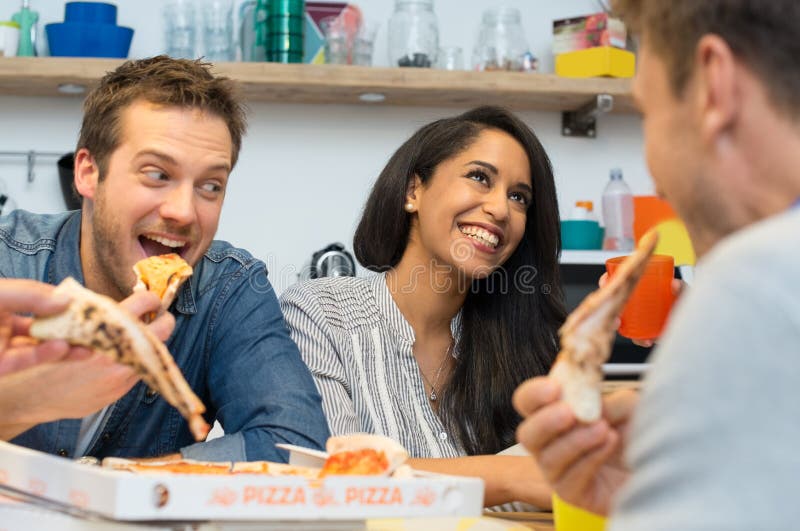 Friends Having Dinner at Home Stock Photo - Image of snack, hungry ...