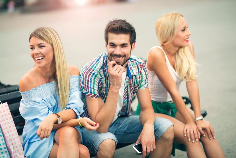 Friends Having Fun on the Bench Stock Image - Image of relax, smiling ...