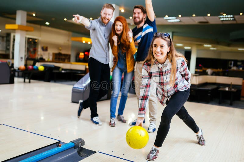 Friends Having Fun while Bowling Stock Photo - Image of adult, indoors ...