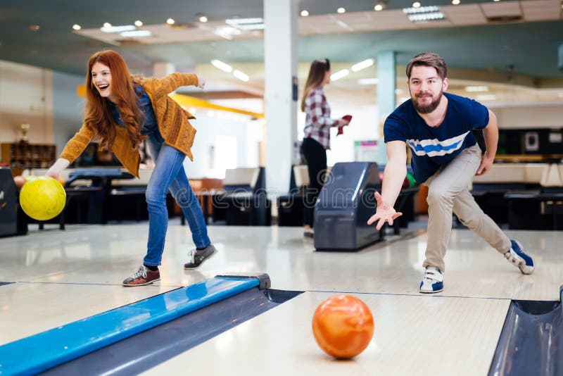 Friends Having Fun while Bowling Stock Photo - Image of enjoy, people ...