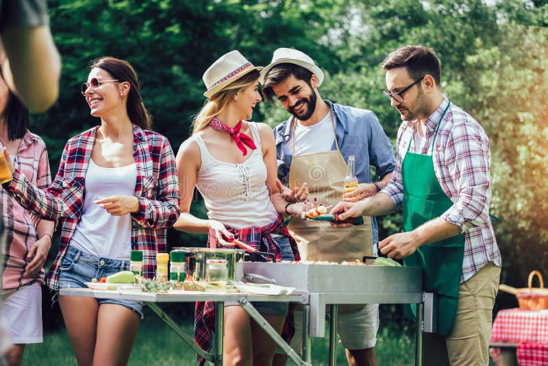 Friends Having Fun Grilling Meat Enjoying Bbq Party Stock Photo - Image ...
