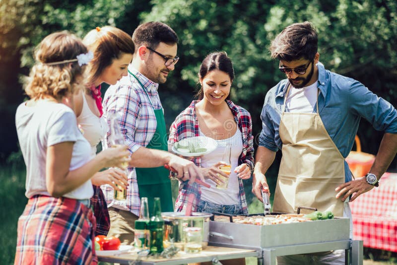 Friends Having Fun in Nature Doing Bbq Stock Image - Image of female ...