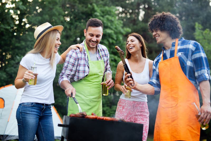 Friends Having Fun In Nature Doing Bbq Stock Image - Image of friends ...