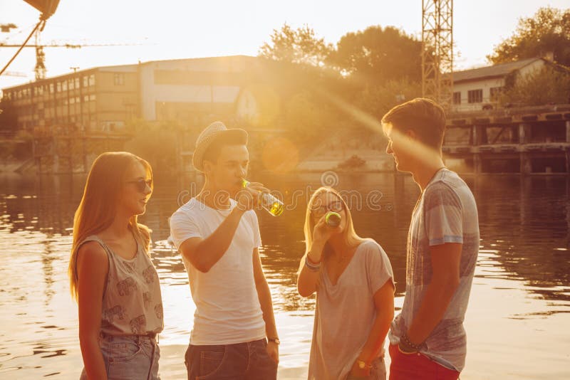 Friends Having Fun Near Lake Stock Photo - Image of adult, coast: 78981074
