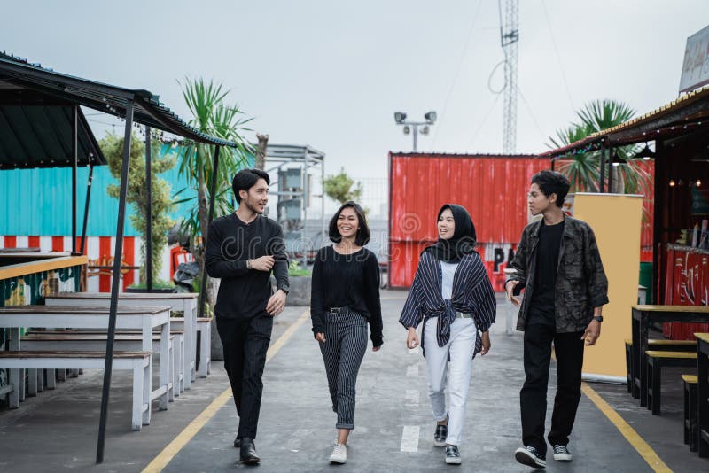 Friends Having Fun Outdoors Walking on the Way Together Stock Photo ...