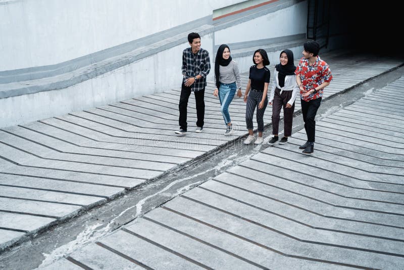 Friends Having Fun Outdoors Walking on the Way Together Stock Photo ...