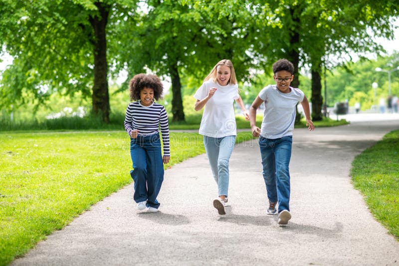 Friends Having Fun in the Park and Feeling Good Together Stock Image ...
