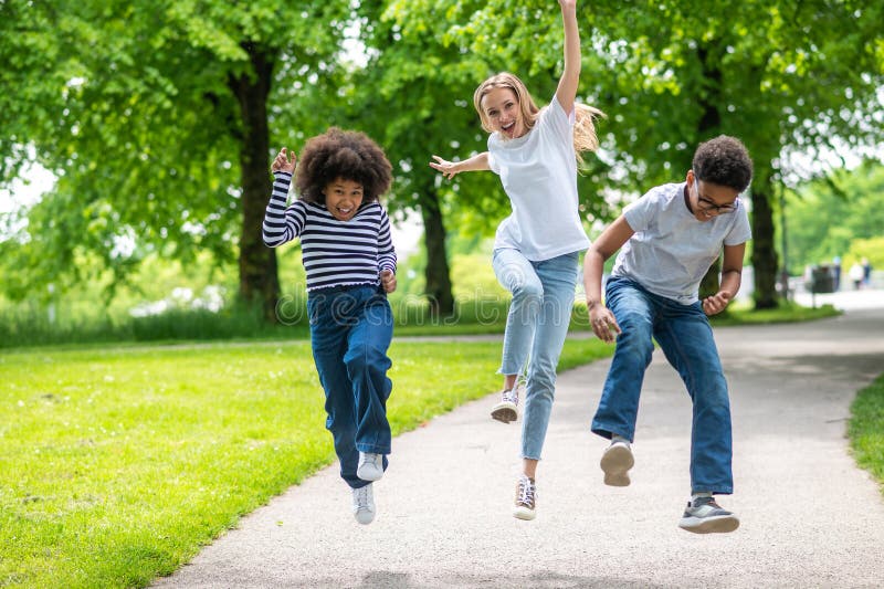 Friends Having Fun in the Park and Feeling Good Together Stock Image ...