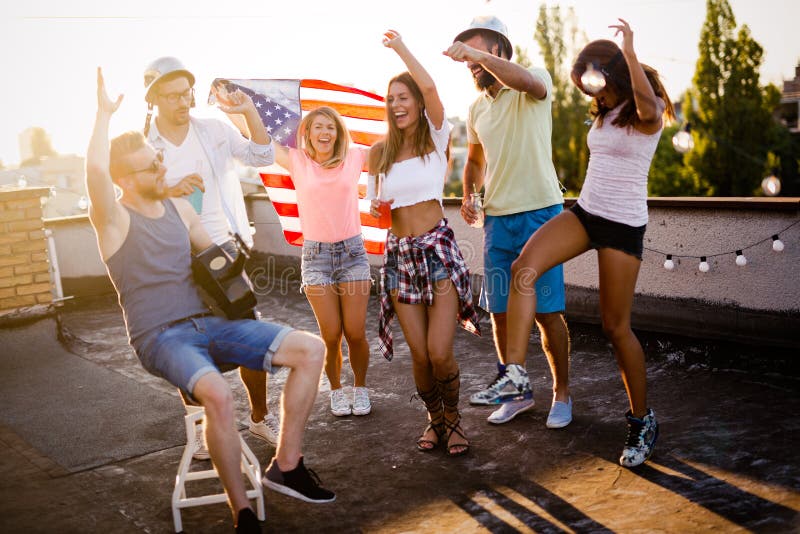 Friends Having Fun at Rooftop Party. Stock Photo - Image of rooftop ...