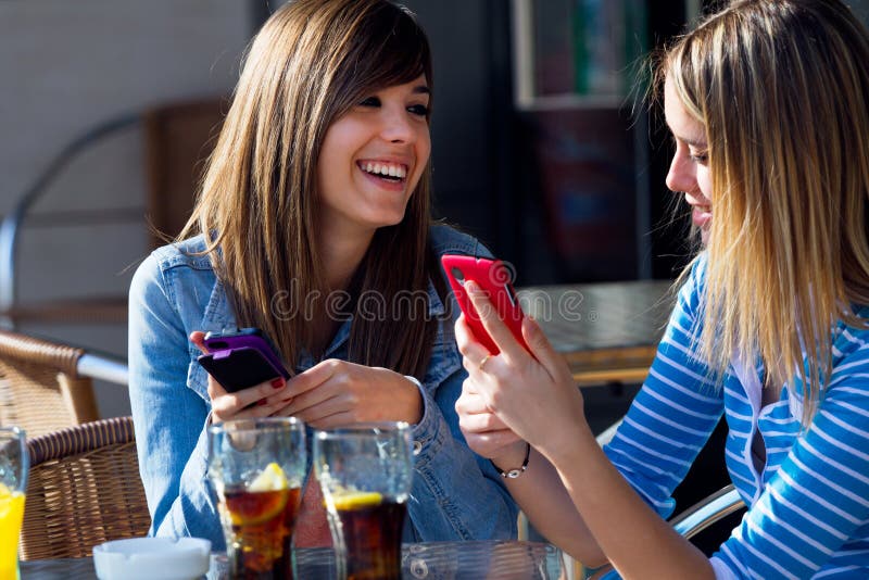 Friends Having Fun with Smartphones Stock Image - Image of socializing ...