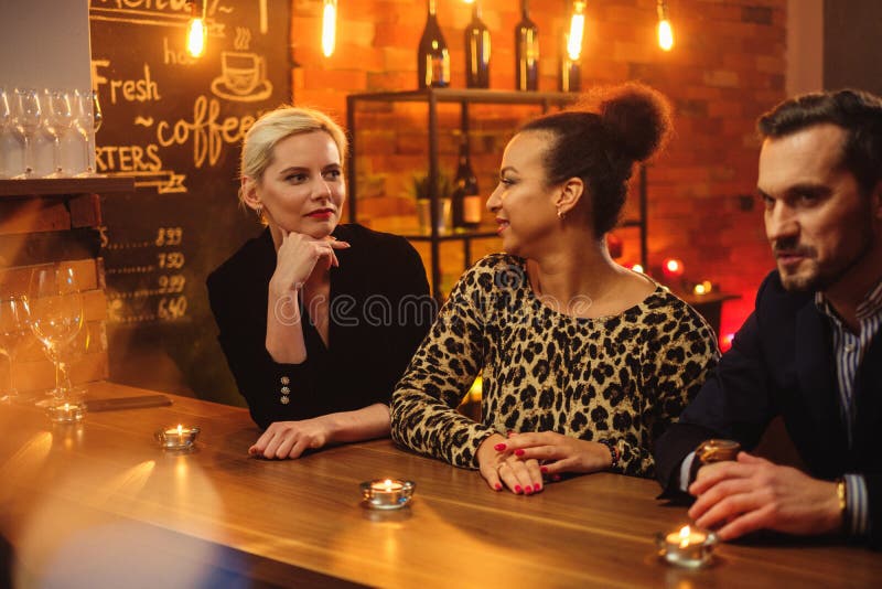 Friends Having Fun Talk Behind Bar Counter in a Cafe Stock Photo ...