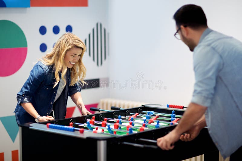 Friends Having Fun Together Playing Table Football Stock Image - Image ...