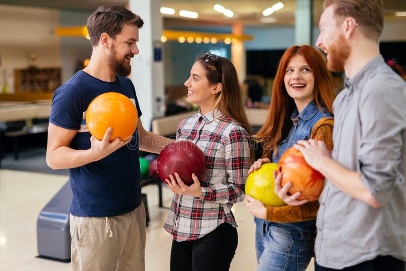 Friends Having Great Time Playing Bowling Stock Photo - Image of ...