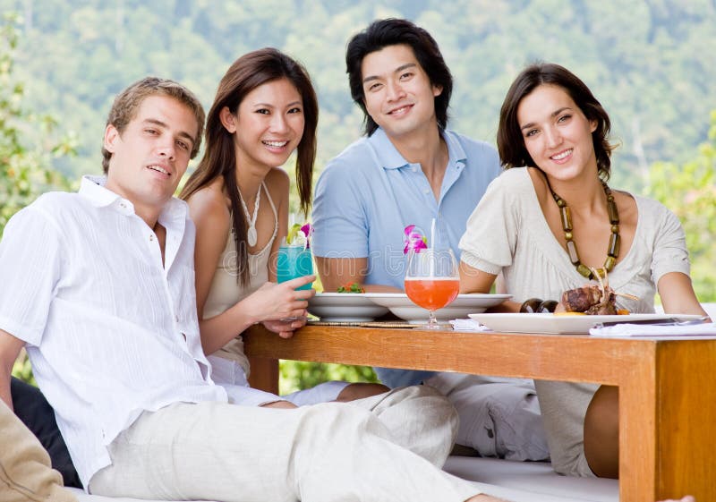 Friends Having Lunch stock image. Image of lifestyle, looking - 4474369
