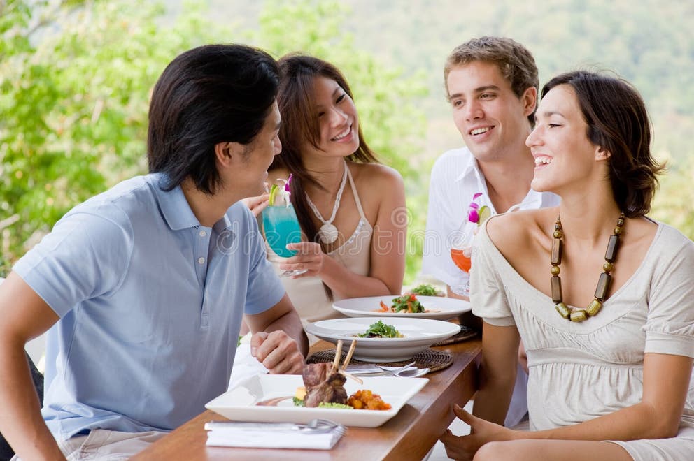 Friends Having Lunch stock image. Image of outdoors, outside - 4560317