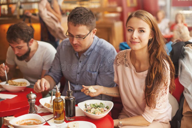 Friends having lunch stock image. Image of eating, lifestyle - 61740663