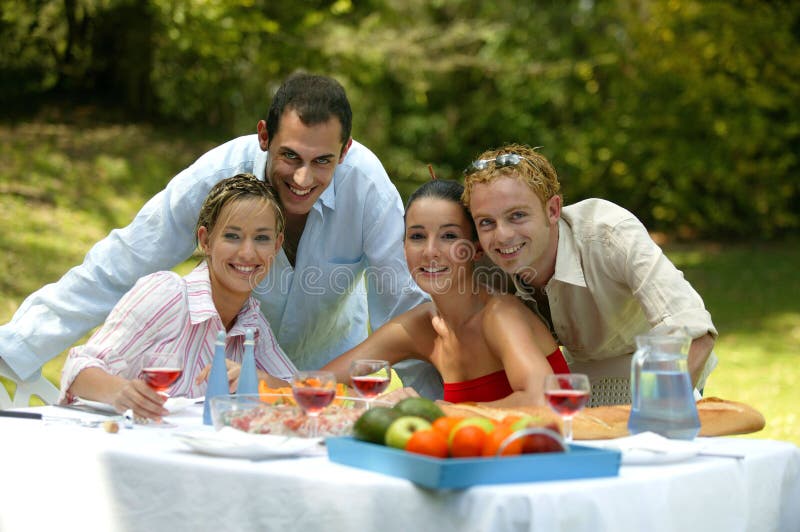 Outdoor lunch with friends stock image. Image of cheerful - 4651085