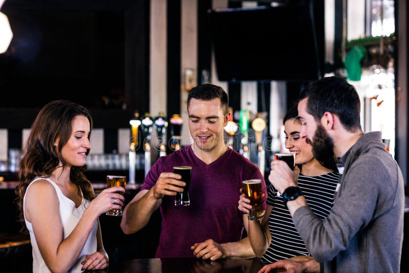 Friends having a pint stock image. Image of food, leisure - 66148049