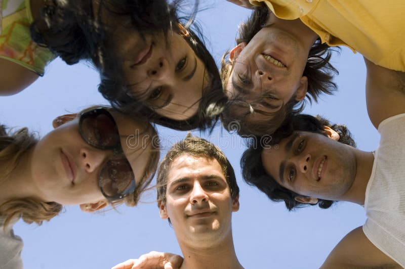 Friends with Heads Together Stock Photo - Image of friends, outdoors ...