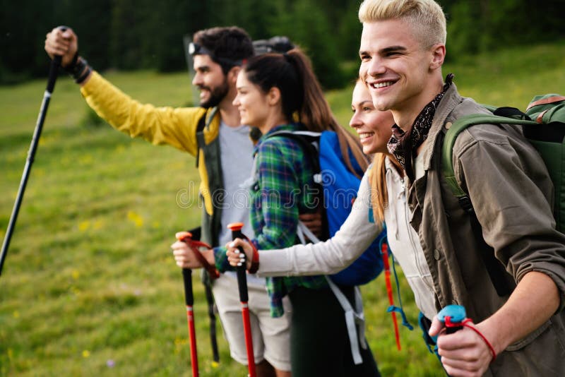 Group of Friends Hiking Together Outdoors Exploring the Wilderness and ...