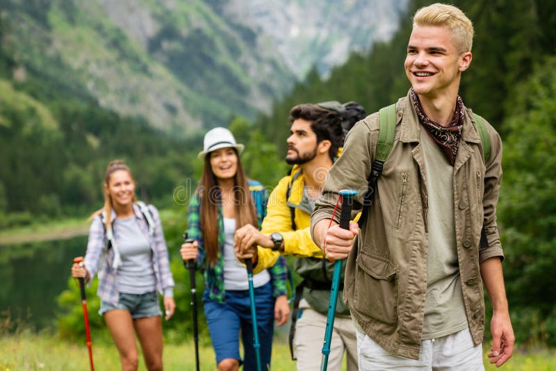 Group of Friends Hiking Together Outdoors Exploring the Wilderness and ...