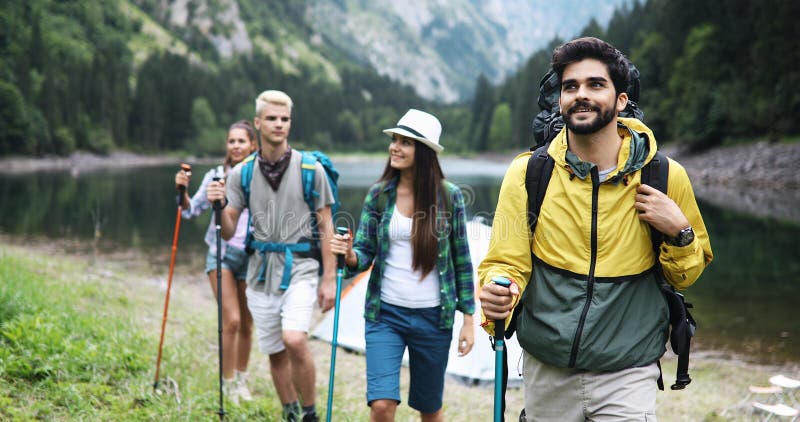 Group of Friends Hiking Together Outdoors Exploring the Wilderness and ...