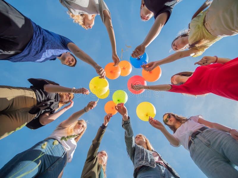 Friends are Holding Colorful Balloons in Their Hands. Stock Image ...