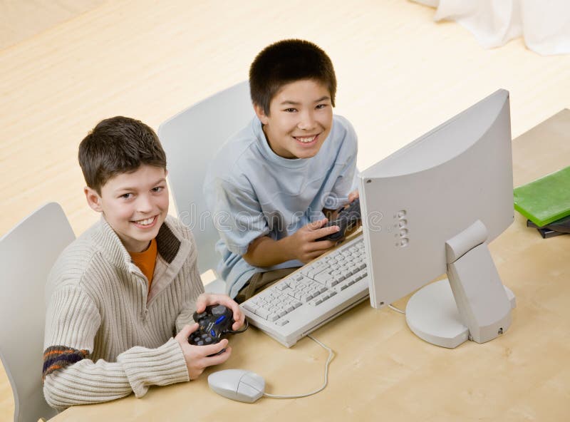 Friends Holding Video Game Controllers Having Fun Stock Photo - Image ...