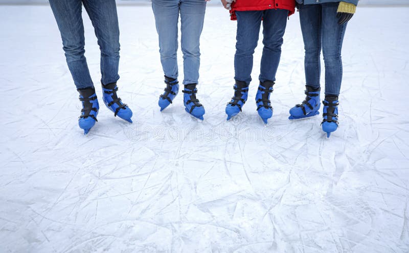 Friends at Ice Skating Rink Outdoors, Closeup. Space for Text Stock ...