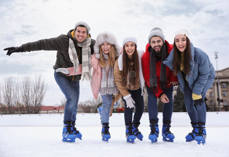 Happy Friends at Ice Skating Rink Outdoors Stock Photo - Image of ...