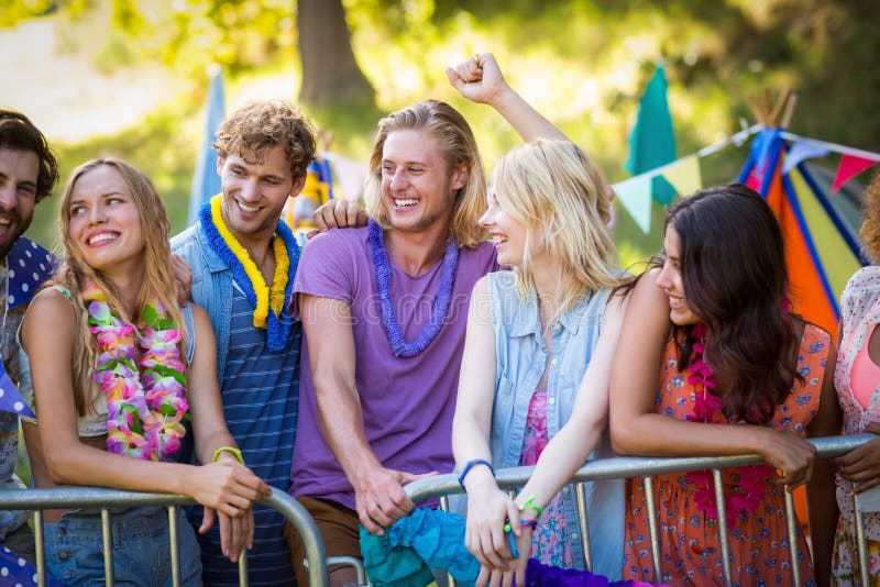 Friends Interacting with Each Other in Park Stock Photo - Image of ...
