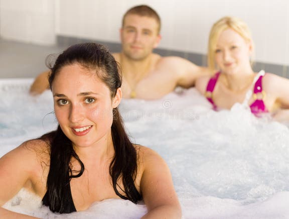 Friends in the jacuzzi stock image. Image of enjoying - 10561415