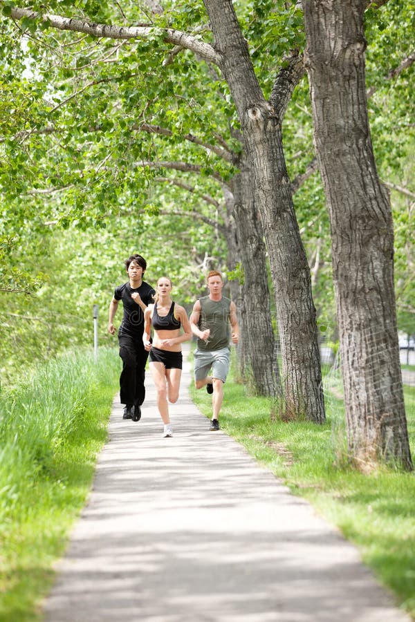 Friends Jogging during Morning Time Stock Photo - Image of males ...