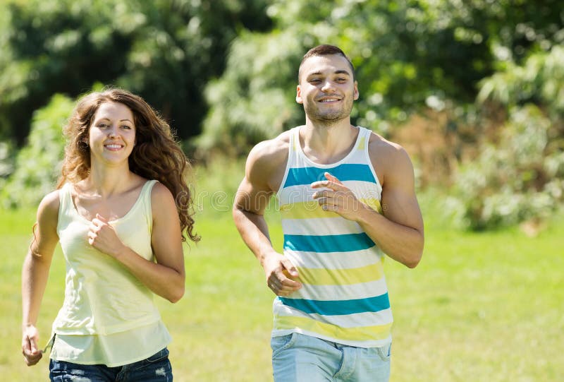 Friends Jogging on Summer Morning Stock Photo - Image of healthy, girl ...
