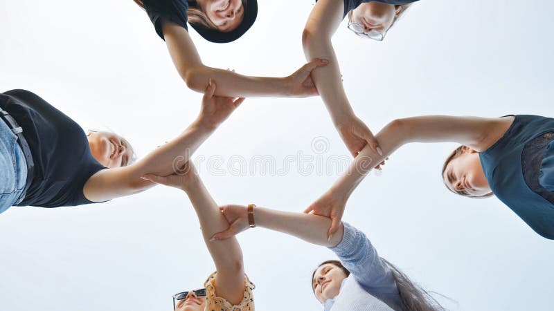 Friends Join Their Wrists and Make a Circle. Strong Friendship Concept ...