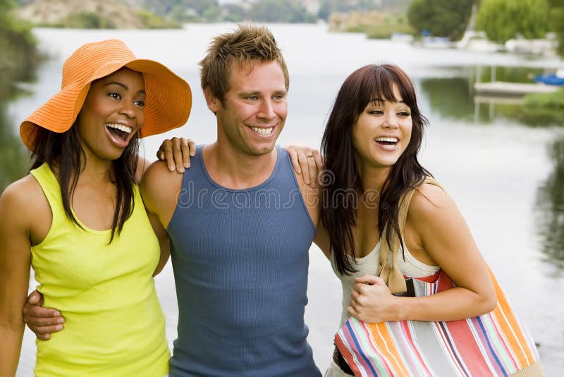 Friends at the lake stock image. Image of lifestyle, physical - 10143507