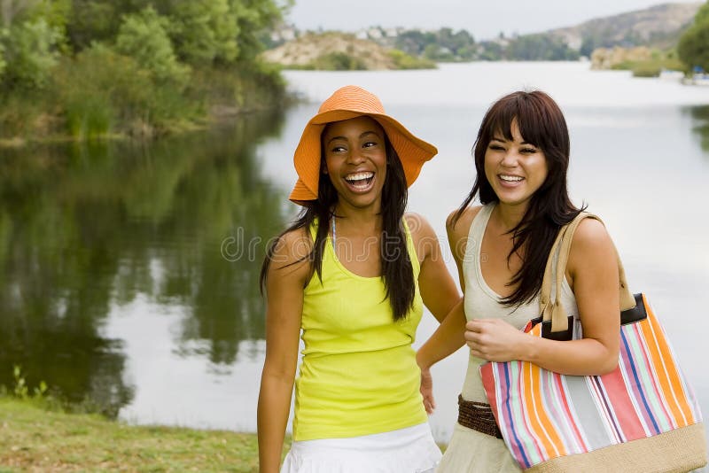 Friends at the lake stock image. Image of physical, beautiful - 9876785