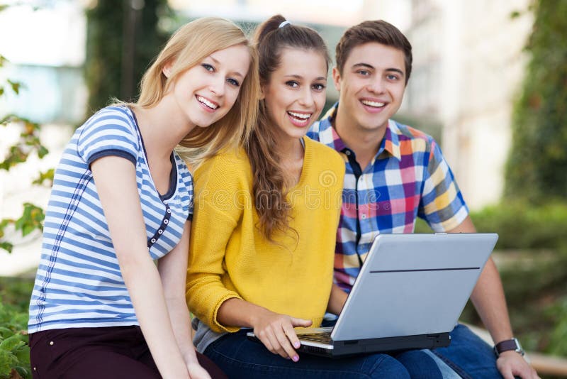 Friends with laptop stock image. Image of beautiful, girls - 26829811