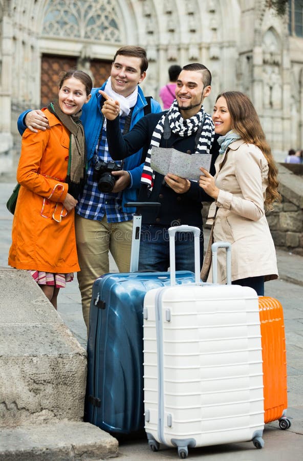 Friends with Luggage Outdoor Stock Photo - Image of chasing, hardcase ...