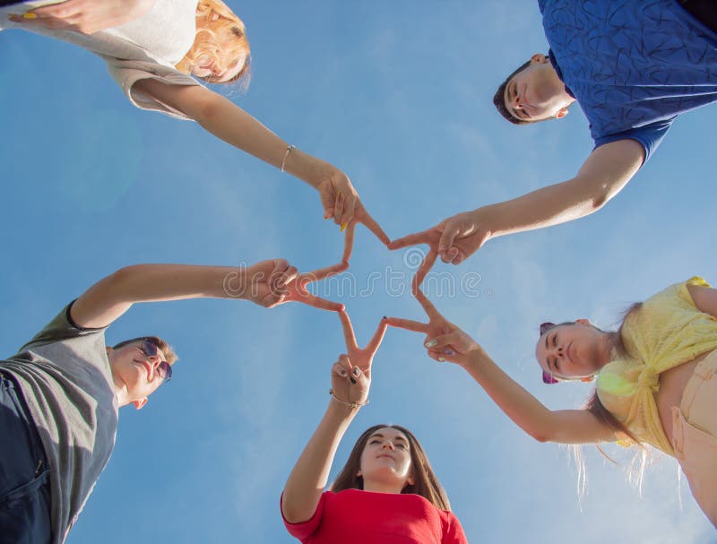 Friends Make a Star Shape from Their Hands. Stock Photo - Image of ...