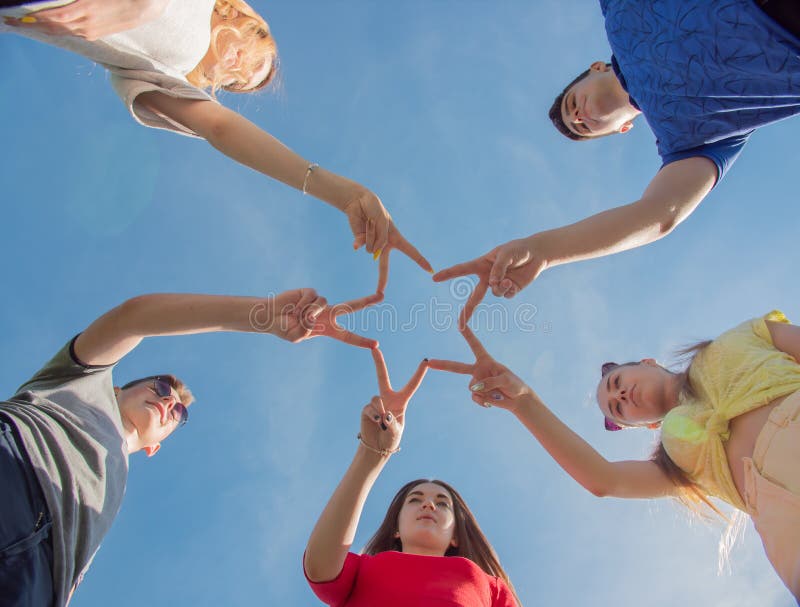 Friends Make a Star Shape from Their Hands. Stock Image - Image of ...