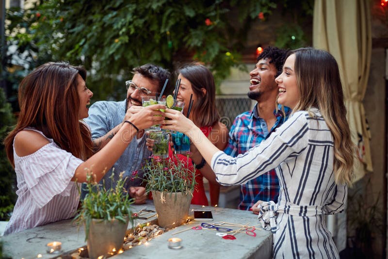 Friends make a toast stock photo. Image of friendship - 187637062
