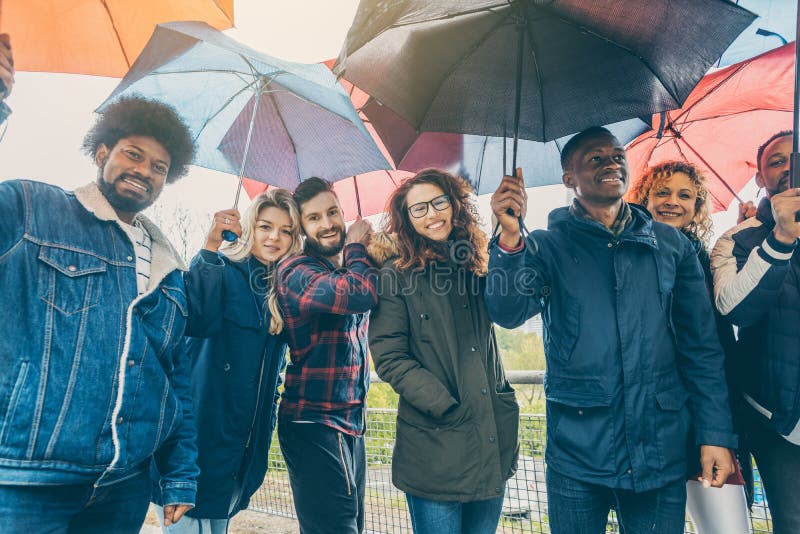 Friends Making the Best of Rain and Bad Weather Stock Image - Image of ...